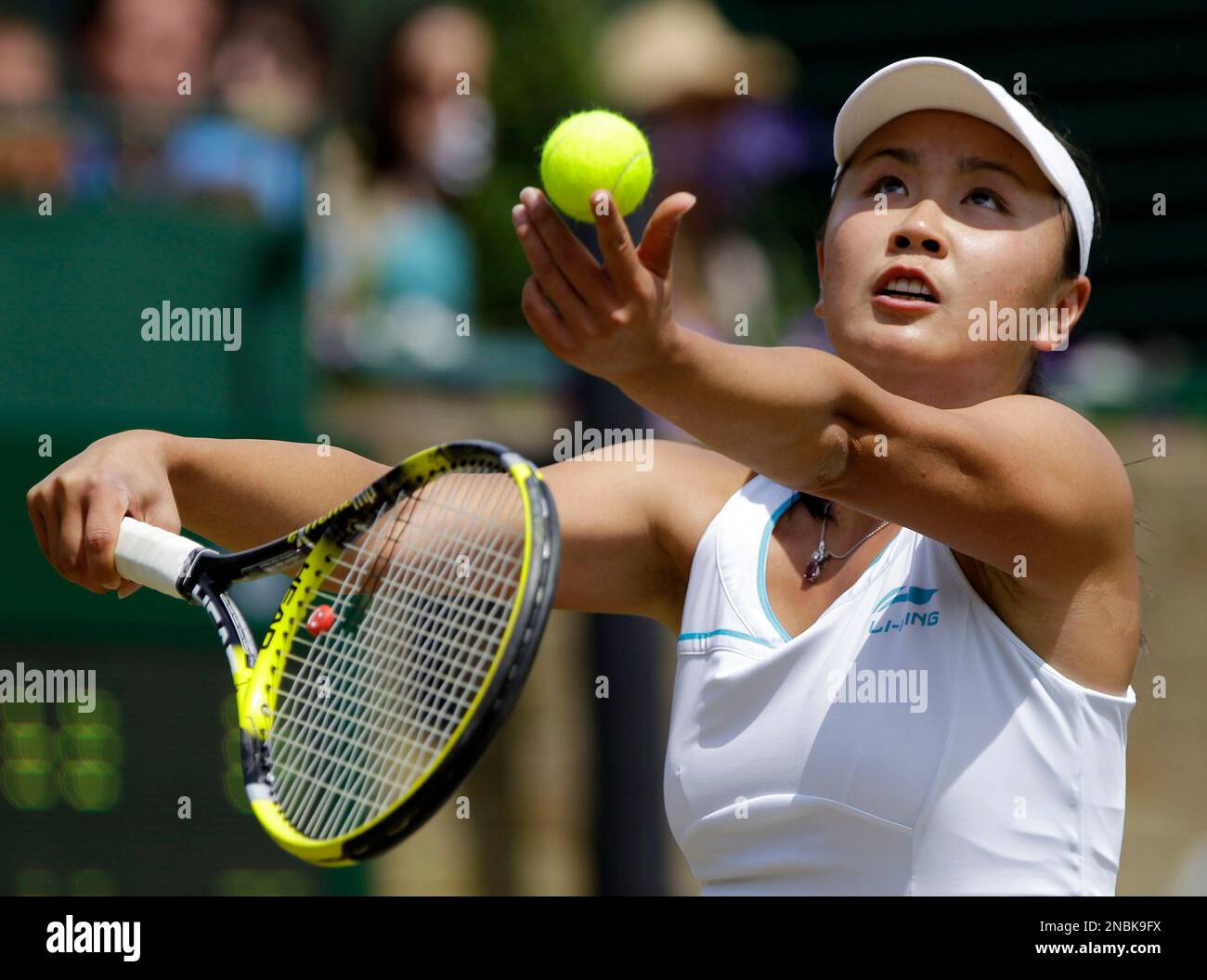 China's Peng Shuai prepares to serve to Britain's Elena Baltacha during ...