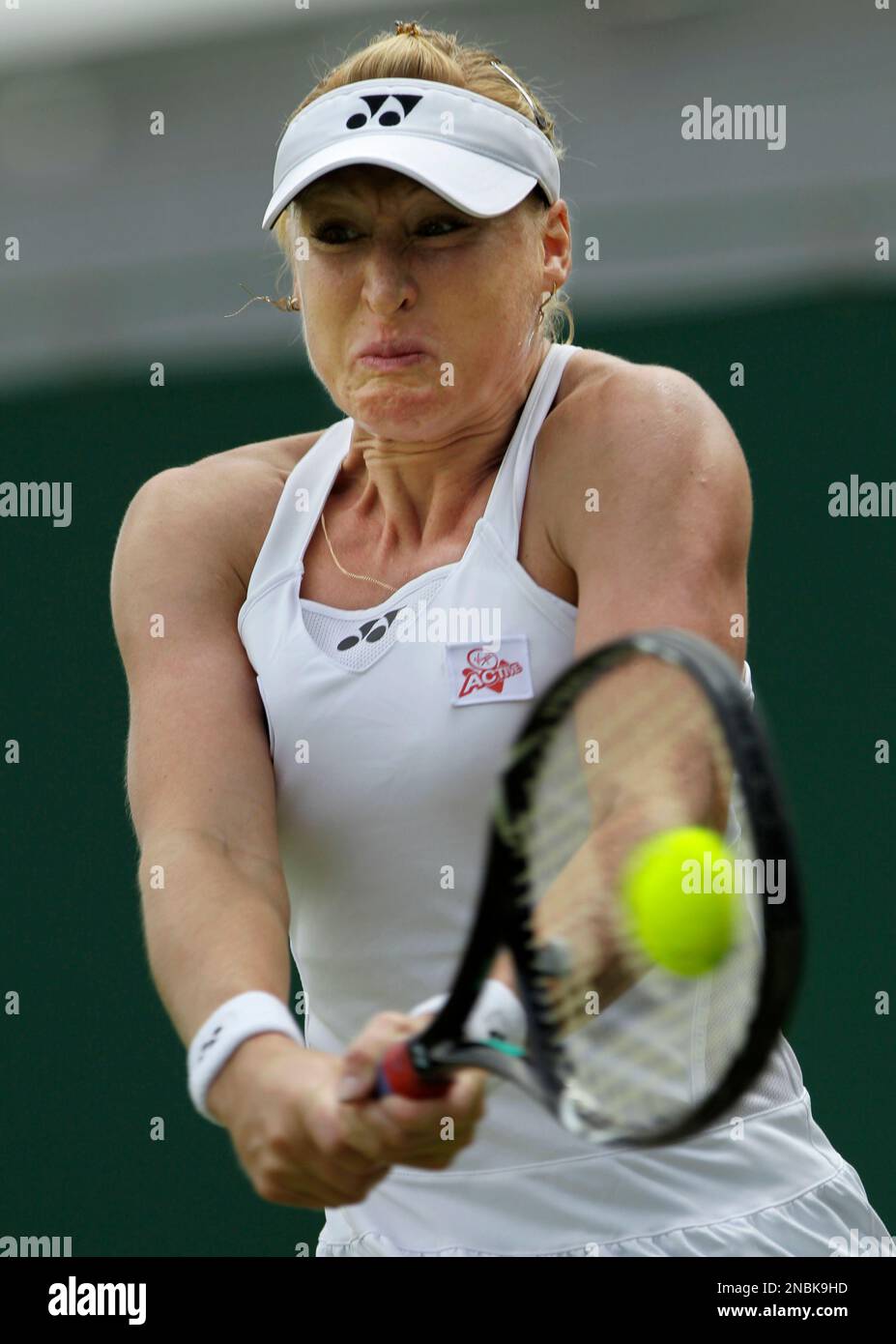 Britain's Elena Baltacha returns a shot to China's Peng Shuai during ...