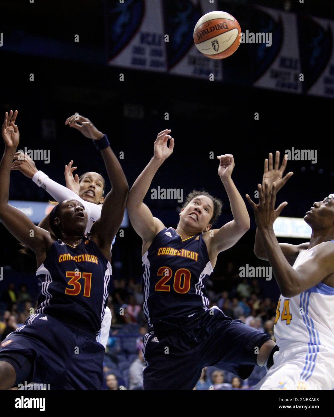 Connecticut Sun's Tina Charles (31) and Kara Lawson (20) battle for a ...