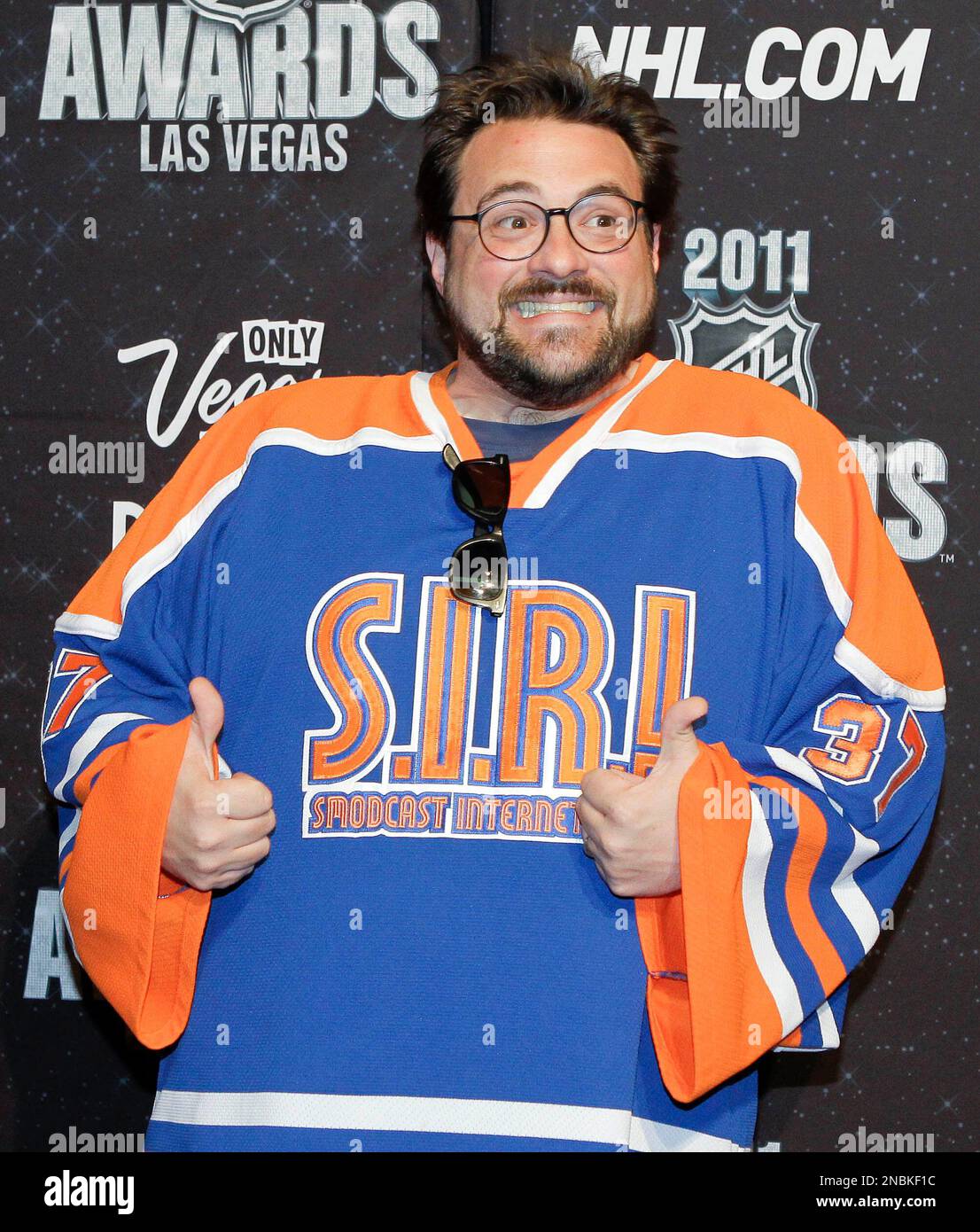 Kevin Smith is photographed on the red carpet at the 2011 NHL Awards ...