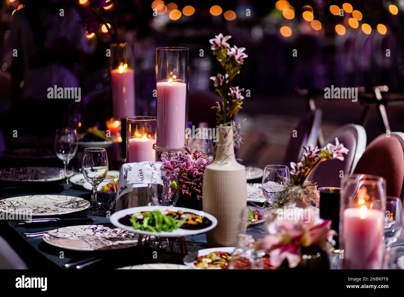 Luxury table settings for fine dining with and glassware, pouring wine ...
