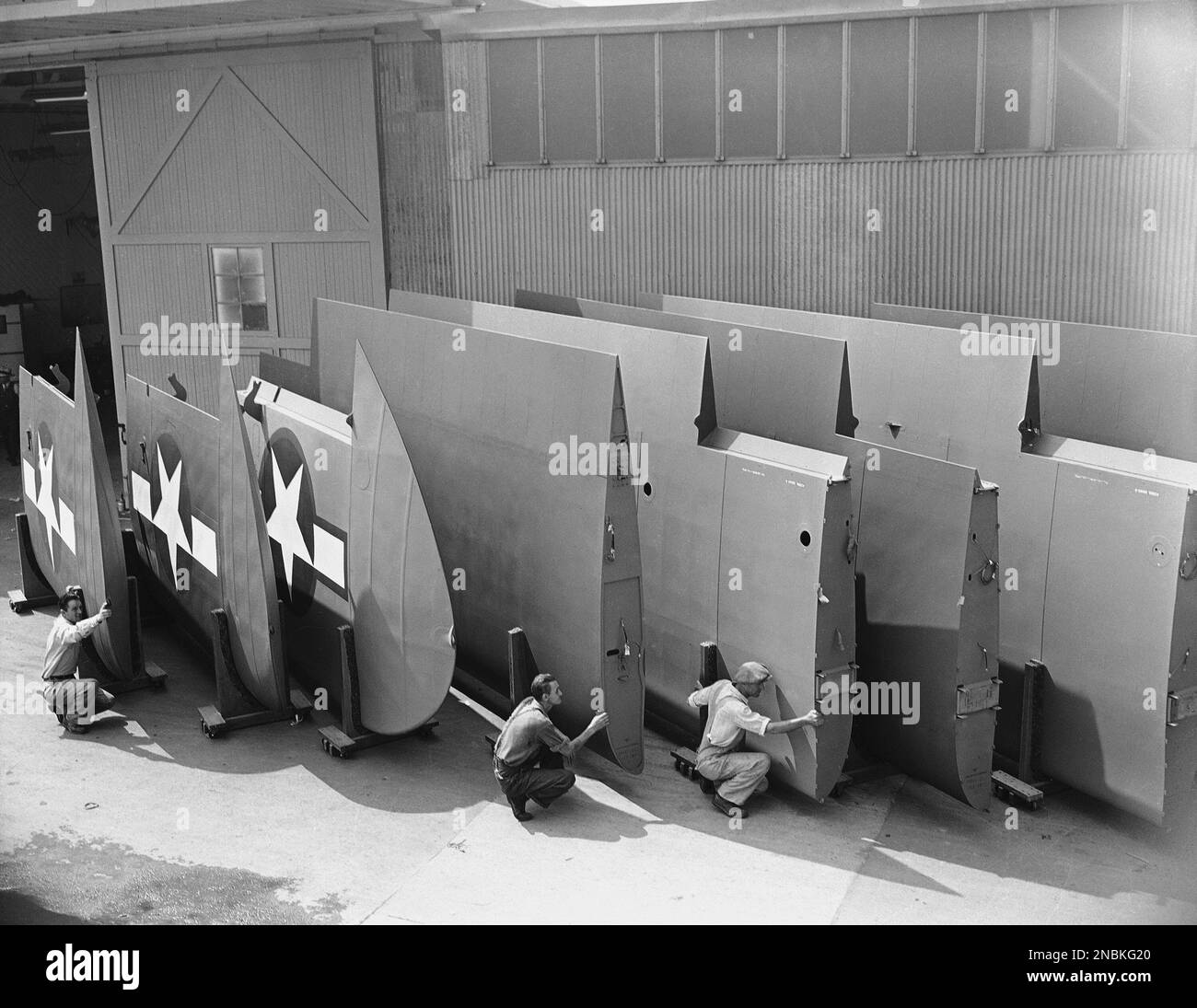 Outboard and inboard wing section are massed, ready for delivery to the ...