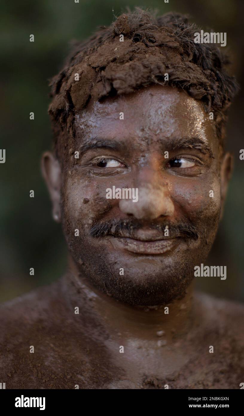 Pakistani Kushti wrestler, Imran Ashraf, 20, smiles with his colleague ...