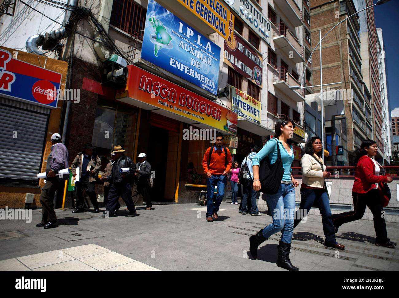 Citizens walk along Villazon Avenue in the Sopocachi suburb of La Paz ...