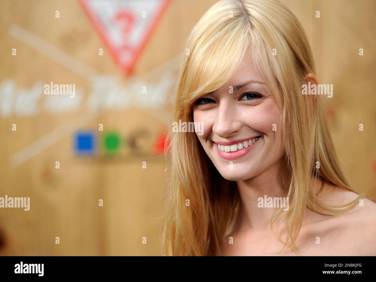 Actress Beth Behrs poses at the unveiling of the revamped GUESS ...