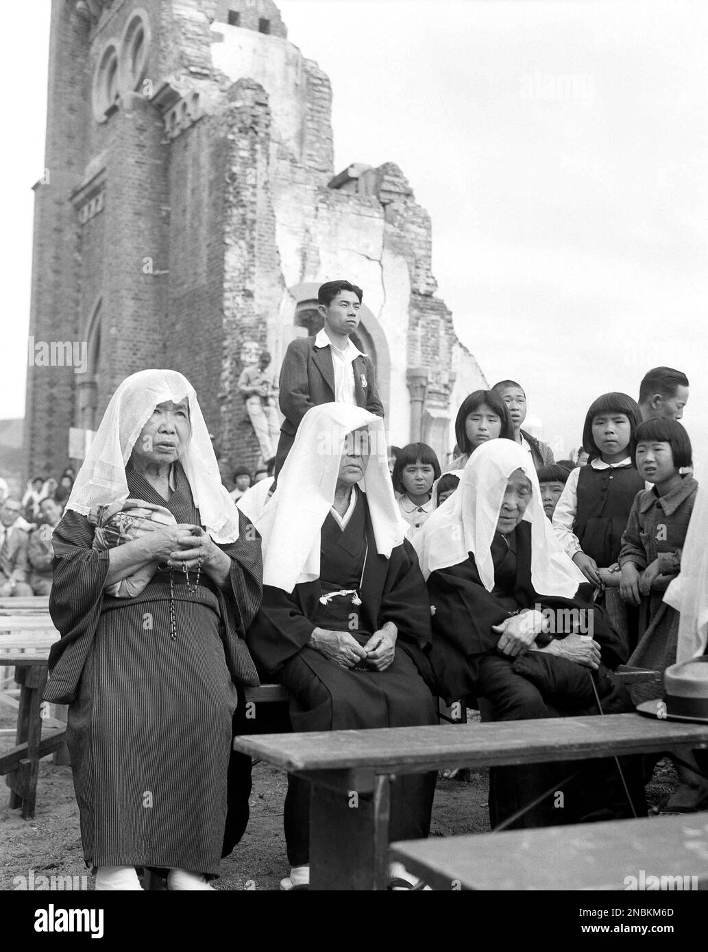 These elderly Japanese Catholic women are at a celebration to mark the ...