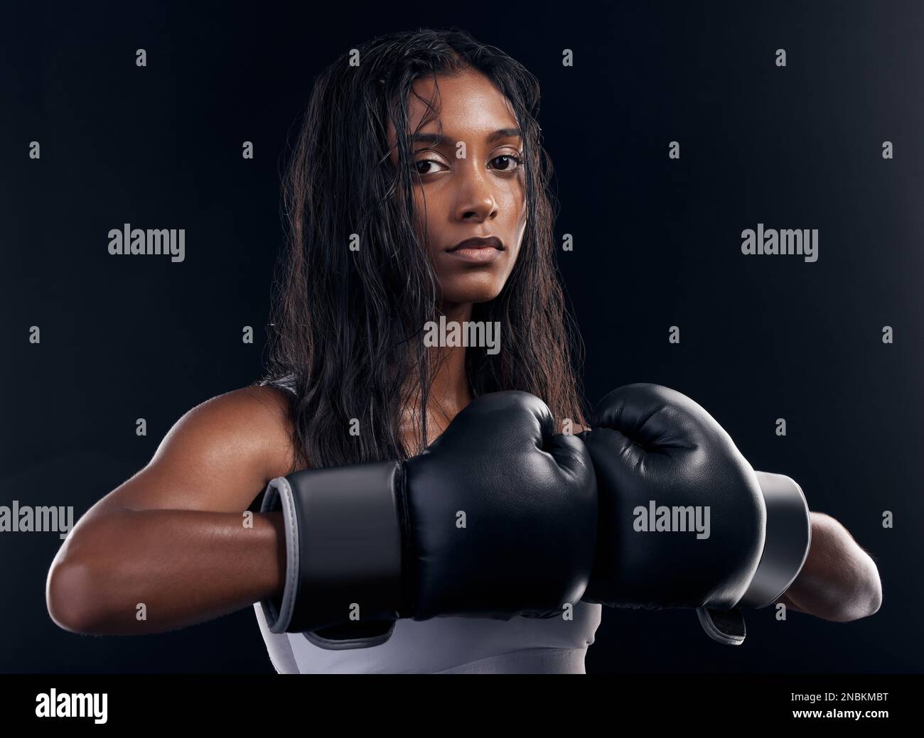 Portrait, woman and boxer with fitness, serious and ready for match ...