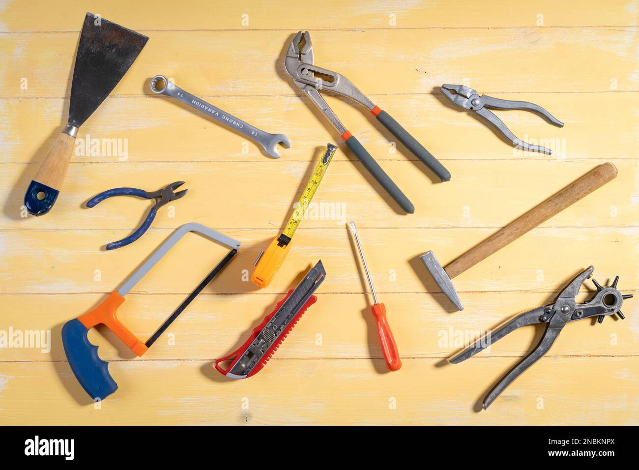 All tools supplies home construction on the yellow wooden background ...