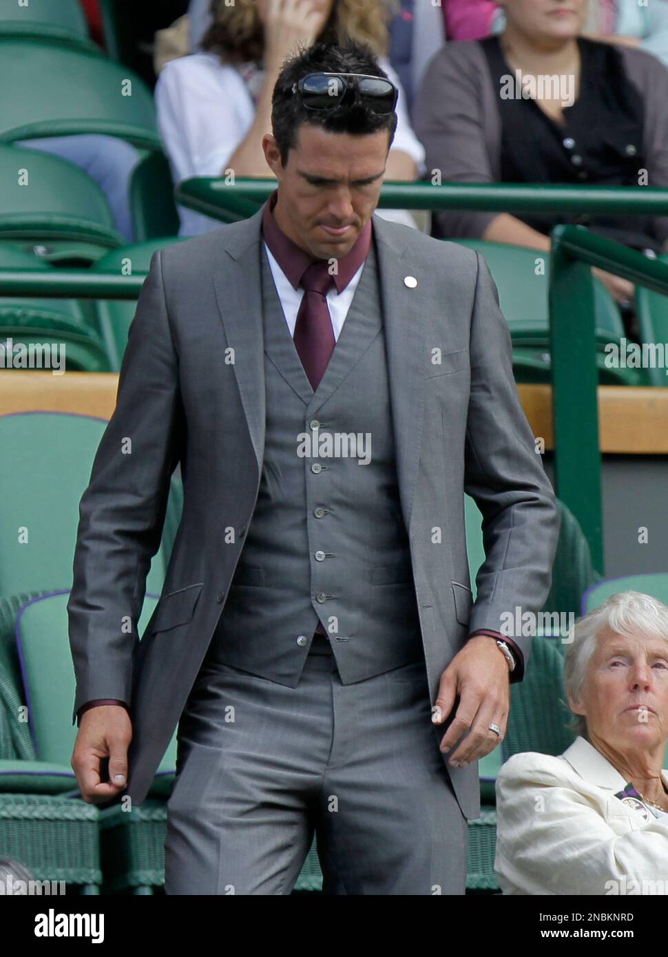 Britain's cricketer Kevin Pietersen watches play on Centre Court at the ...