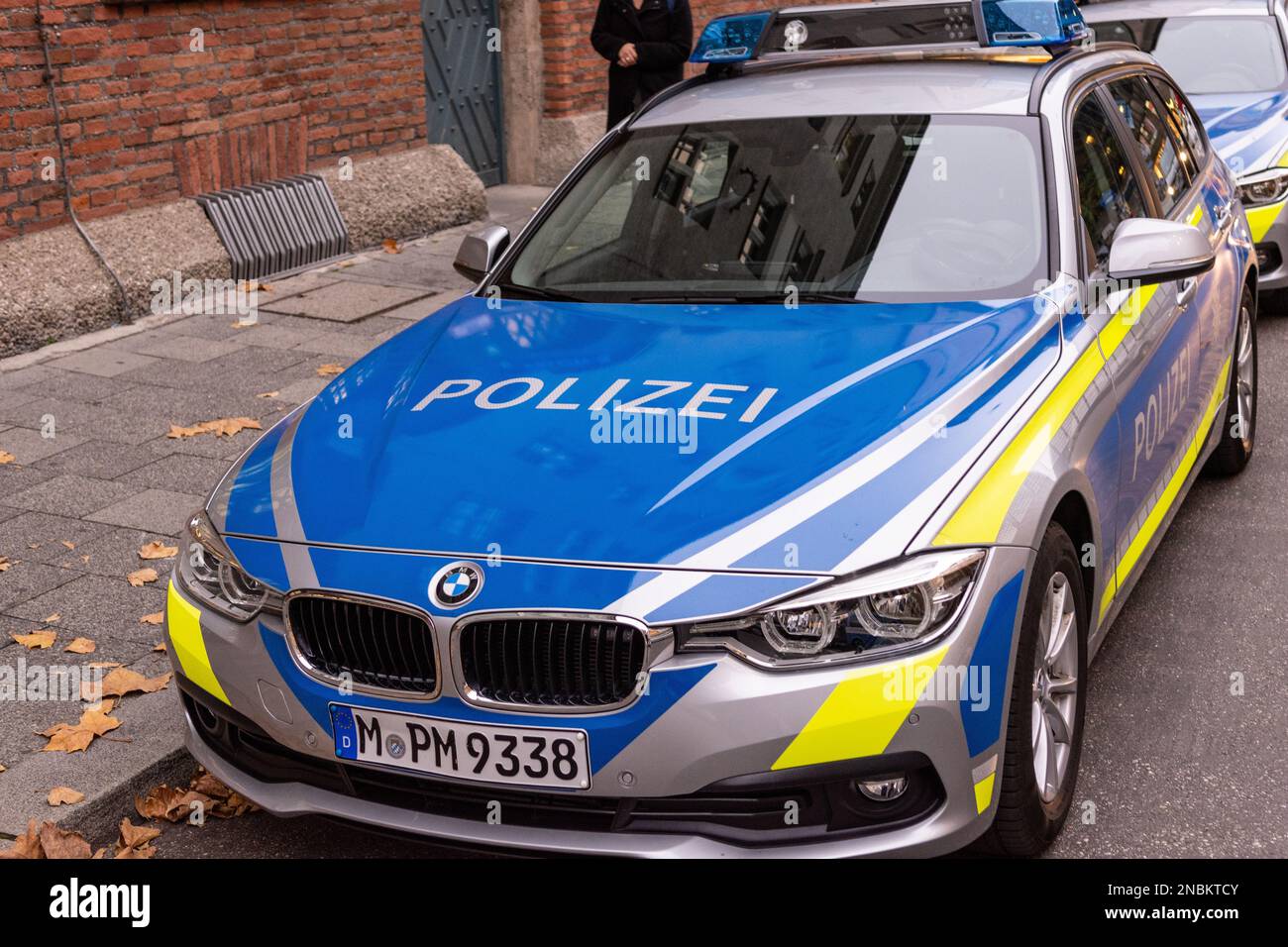 A German police car is parked at the side of the street in Munich ...