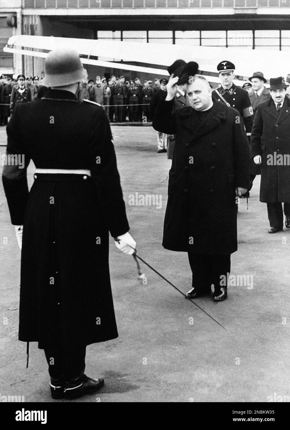 Czechoslovakian Dr. Josef Tiso, right, is saluted by an SS officer on ...