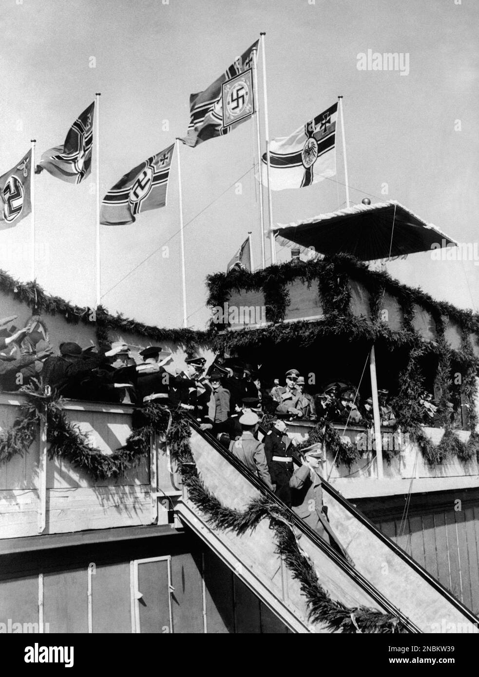 German Chancellor Adolf Hitler leaves the launching platform after the ...