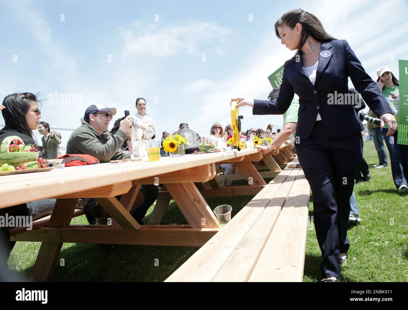 Kim Partrick, adjudicator from the Guinness World Records, measures the ...