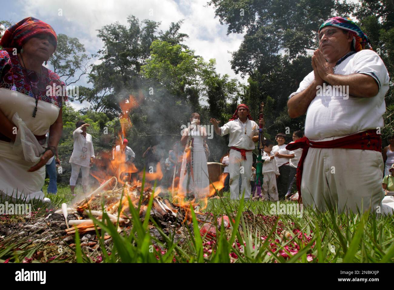 Mayan descendants pray during a ceremony in honor of the upcoming ...
