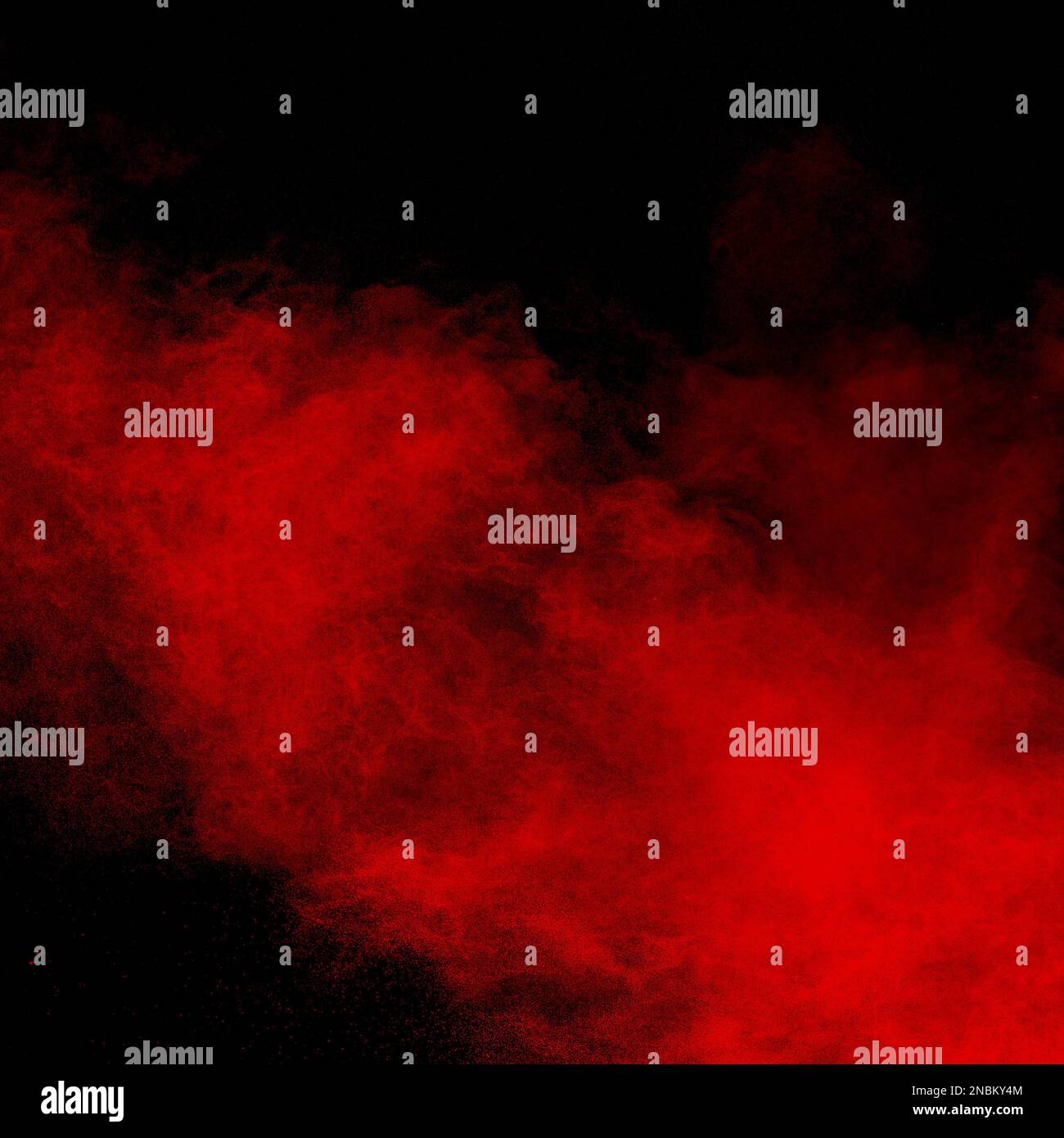 Red color powder explosion on black background.Freeze motion of red ...