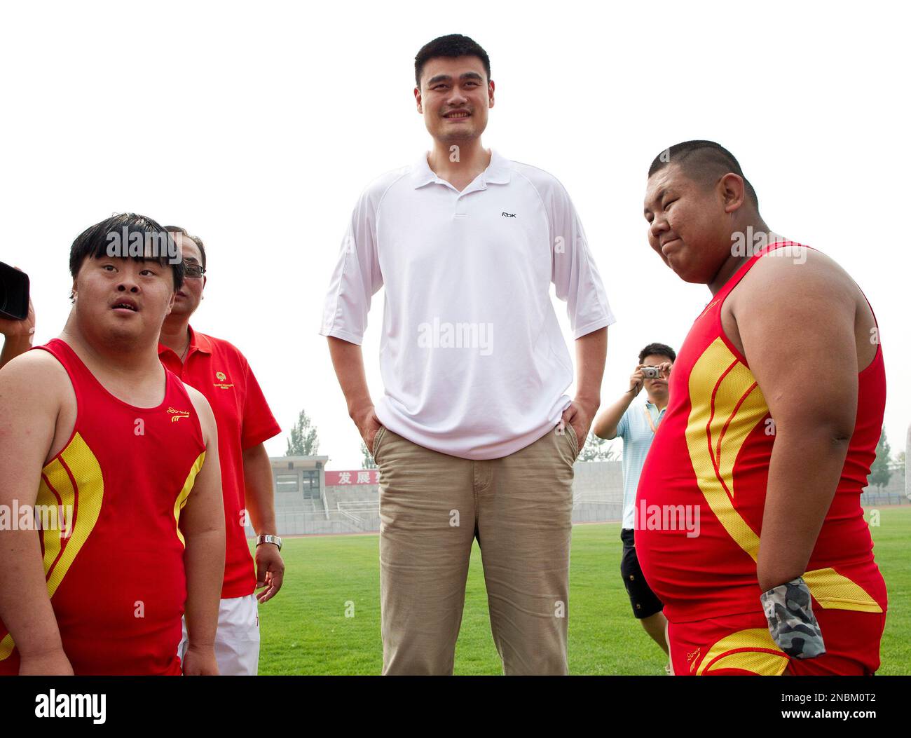 Houston Rockets' Yao Ming of China meets with Chinese disabled athletes ...