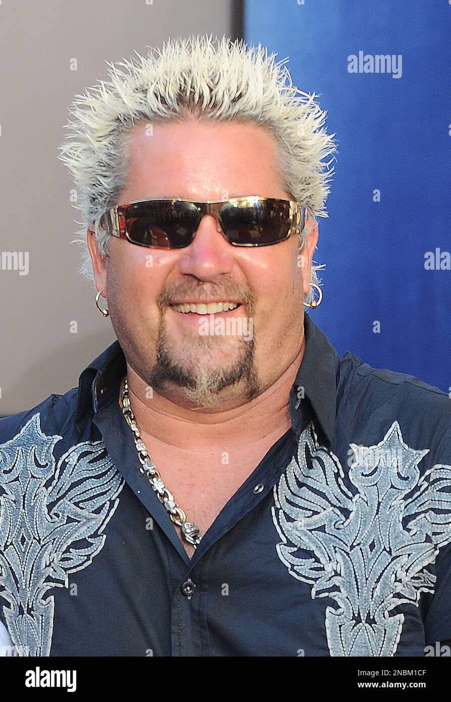 Guy Fieri arrives at the world premiere of "Cars 2" at El Capitan ...