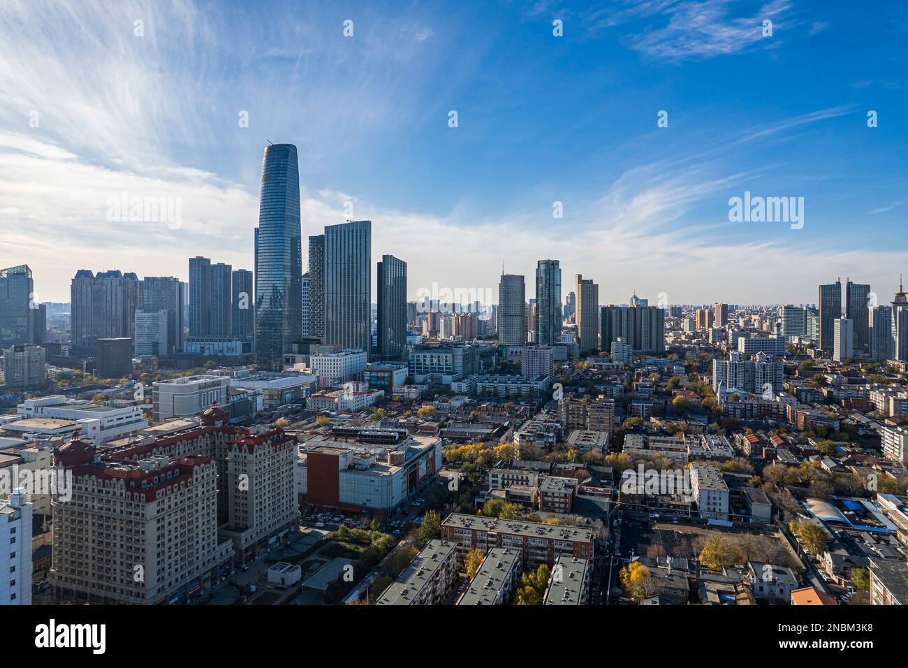 An aerial view of cityscape Tianjin surrounded by buildings Stock Photo ...