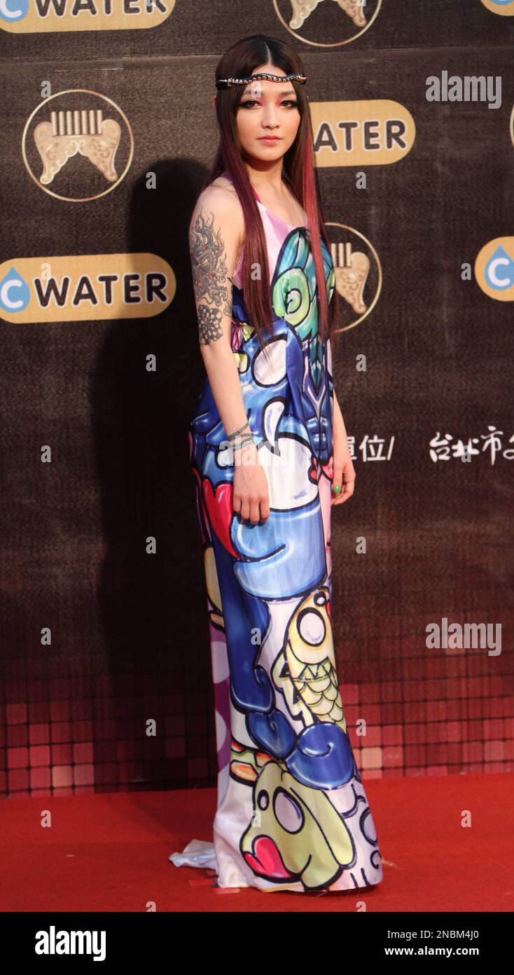 Taiwanese pop singer Mavis Fan poses upon arrives for the 22nd Golden ...