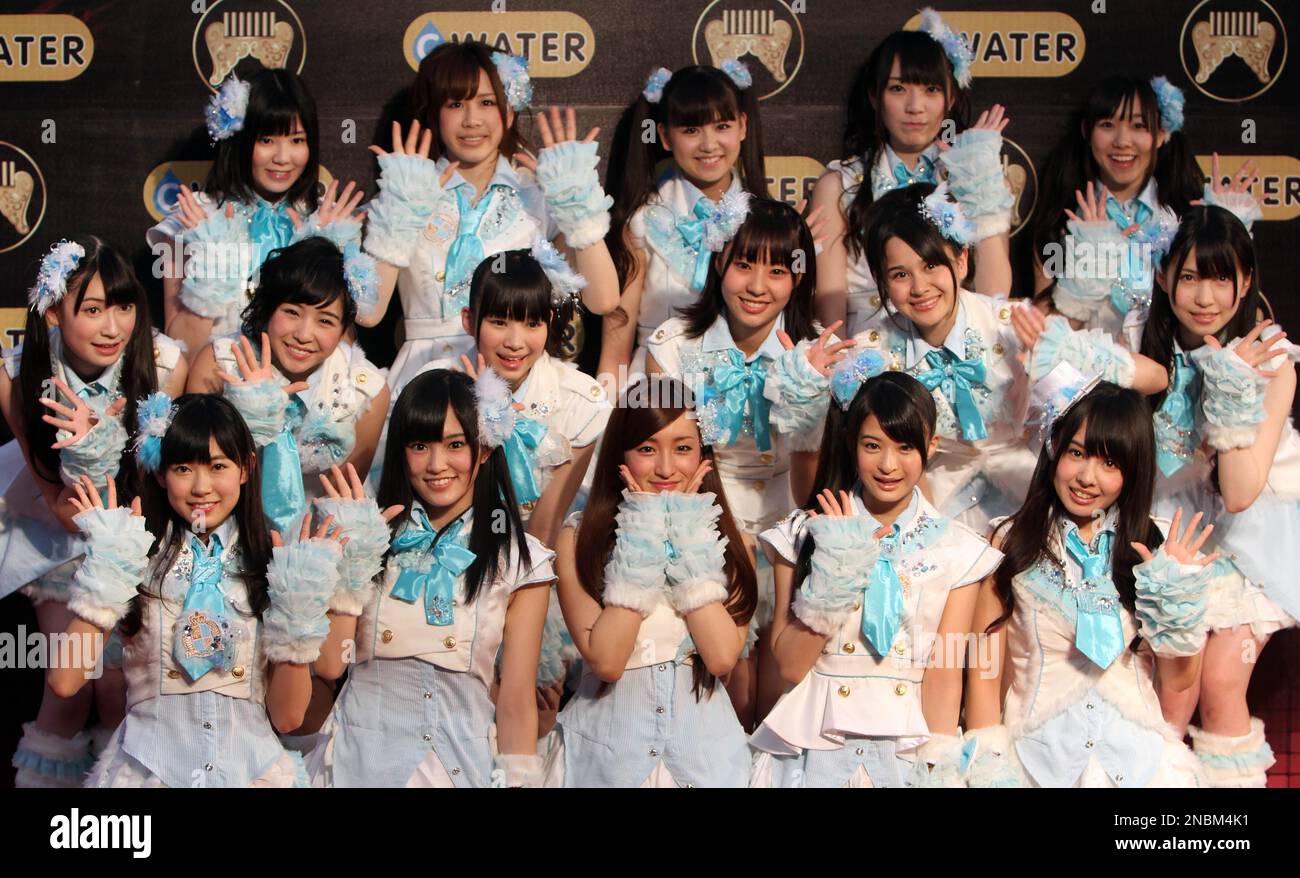 Members of the Japanese female woman pop group AKB48 wave as they ...