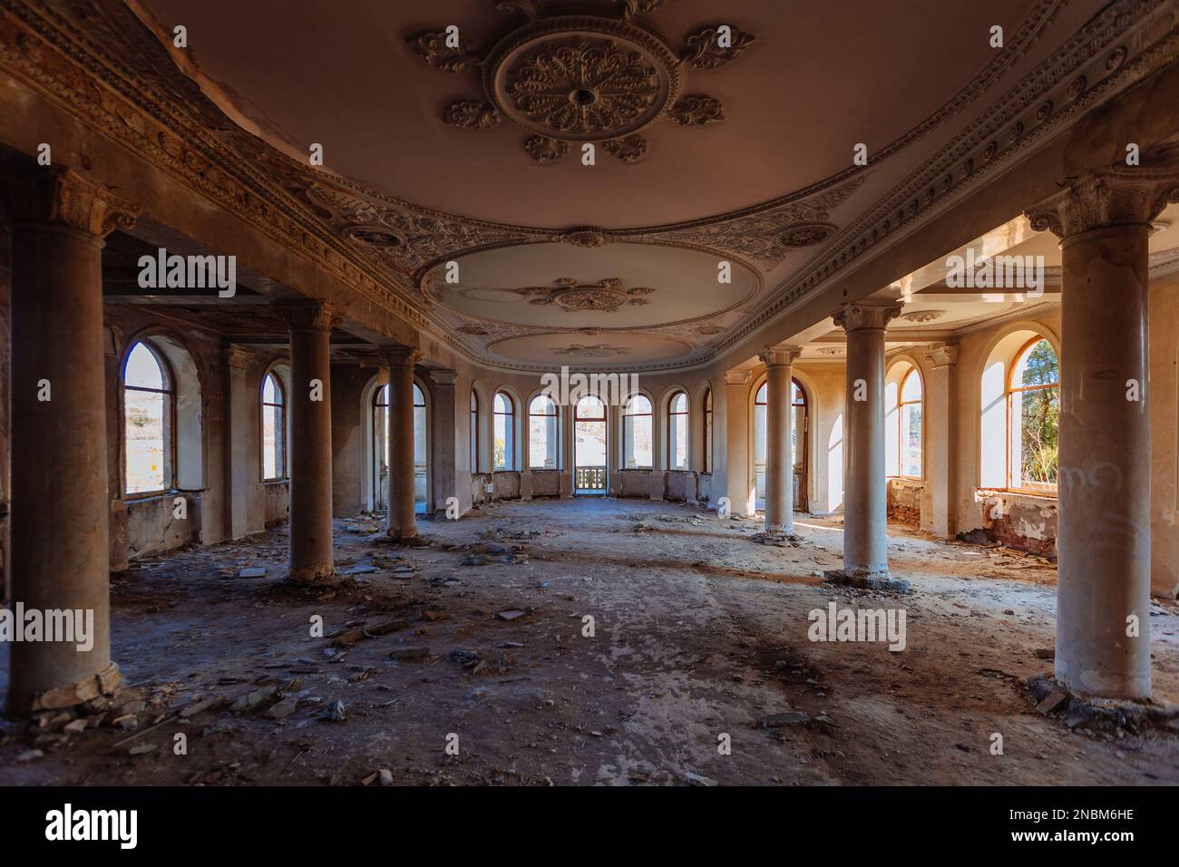 Large hall with columns in old abandoned mansion Stock Photo - Alamy