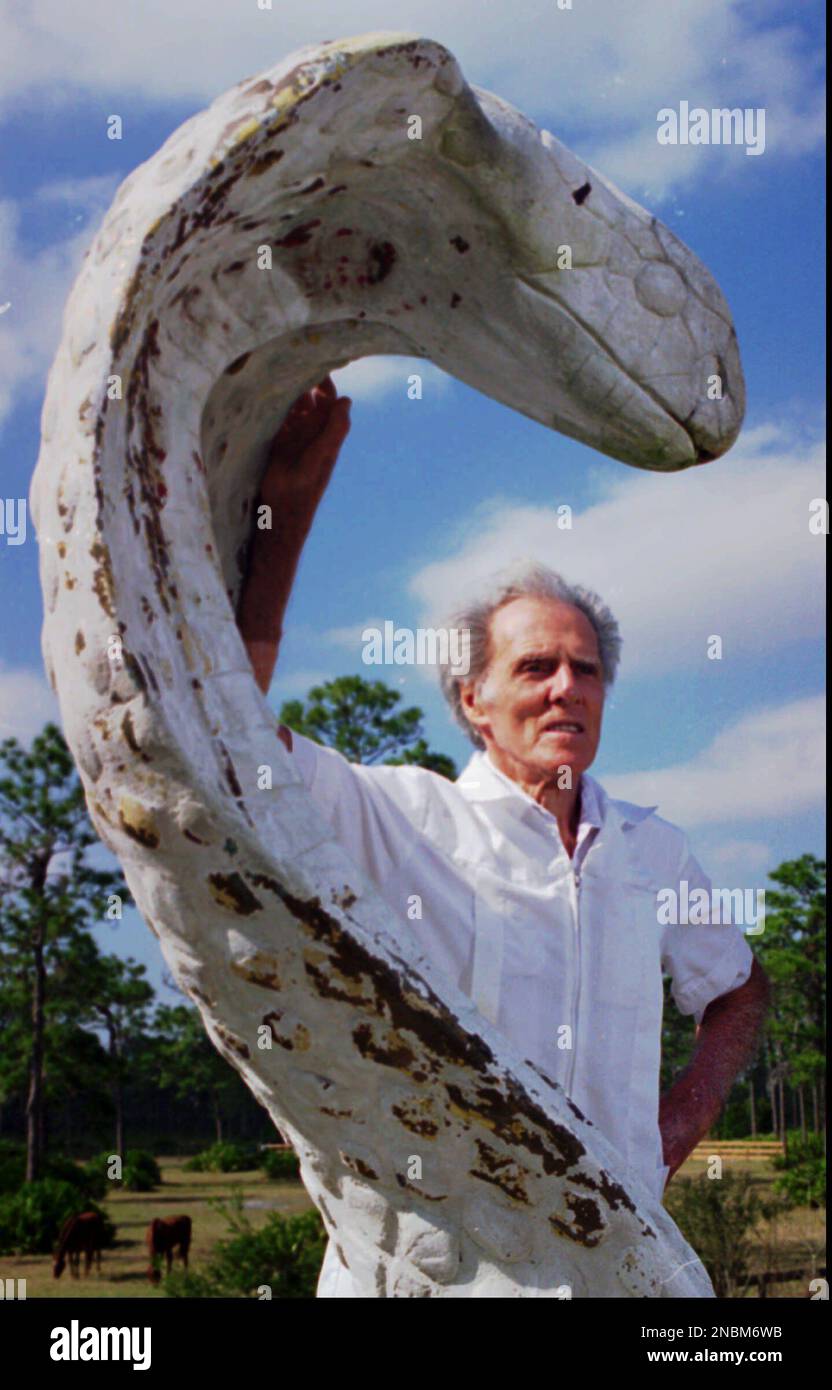 FILE-In this Jan. 22, 1996 file photo, Bill Haast poses by a cobra ...