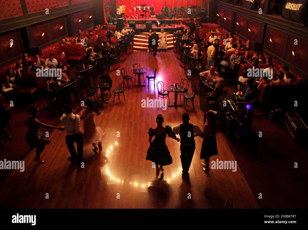 Dancer perform during a reenactment of a 1950 salsa hall during a ...