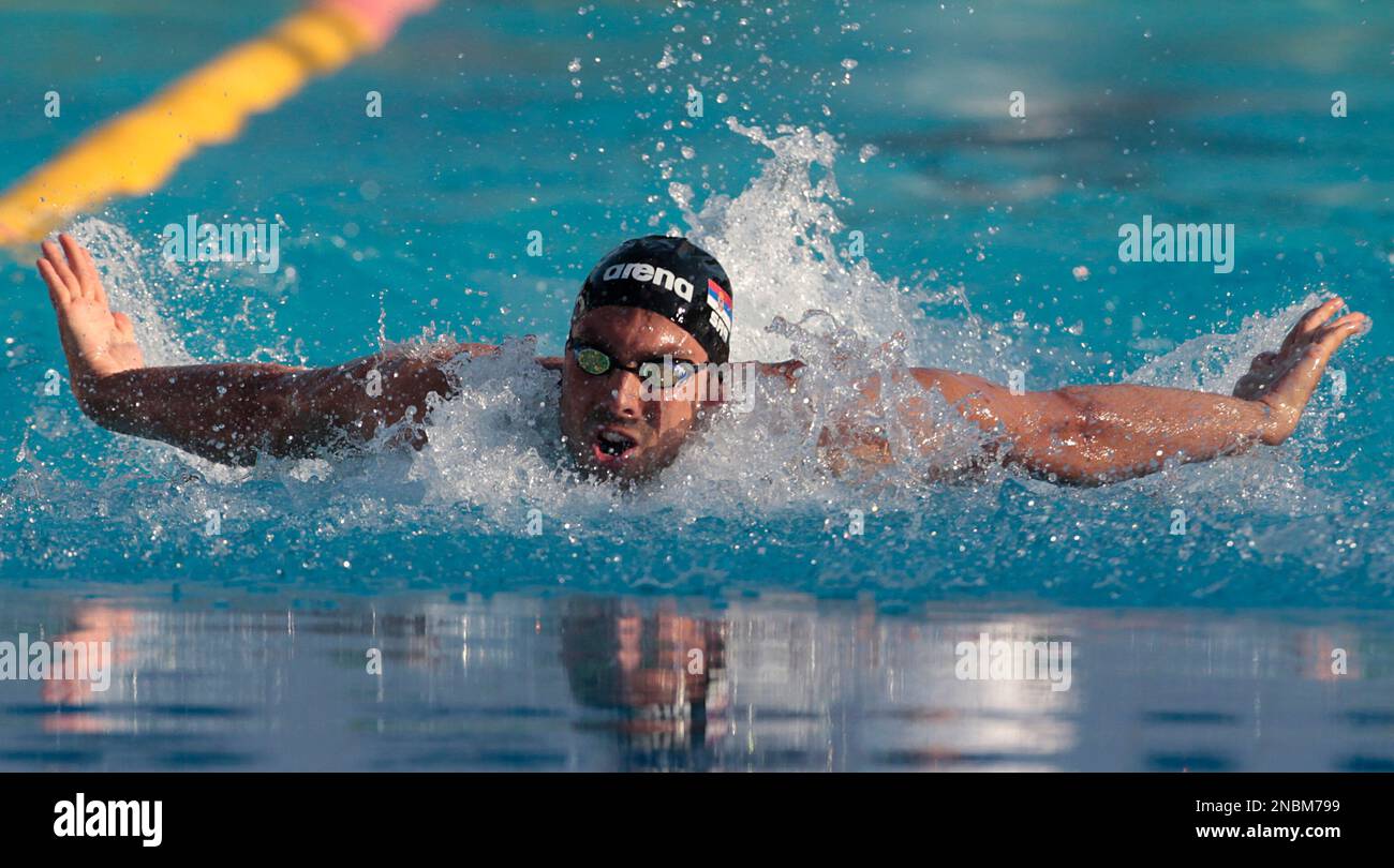 Serbia's Milorad Cavic competes during a men's 100mt butterfly race at ...