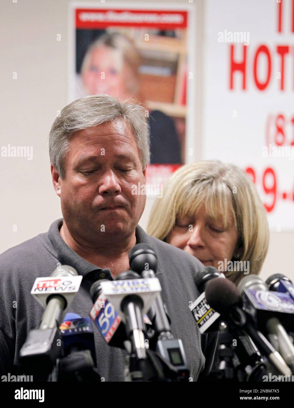 Robert Spierer is comforted by his wife Charlene as he struggles to ...