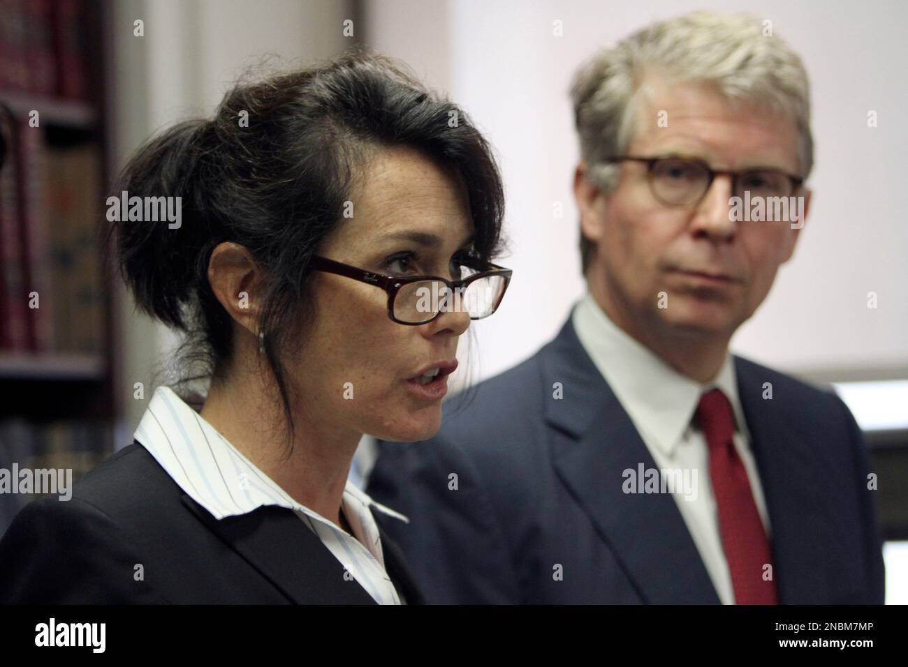 Manhattan District Attorney Cyrus R. Vance Jr., right, listens as ...