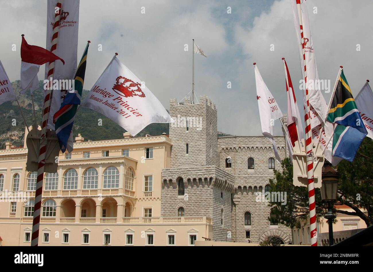 Flags announcing the Royal Wedding in Monaco fly on a flag pole in ...