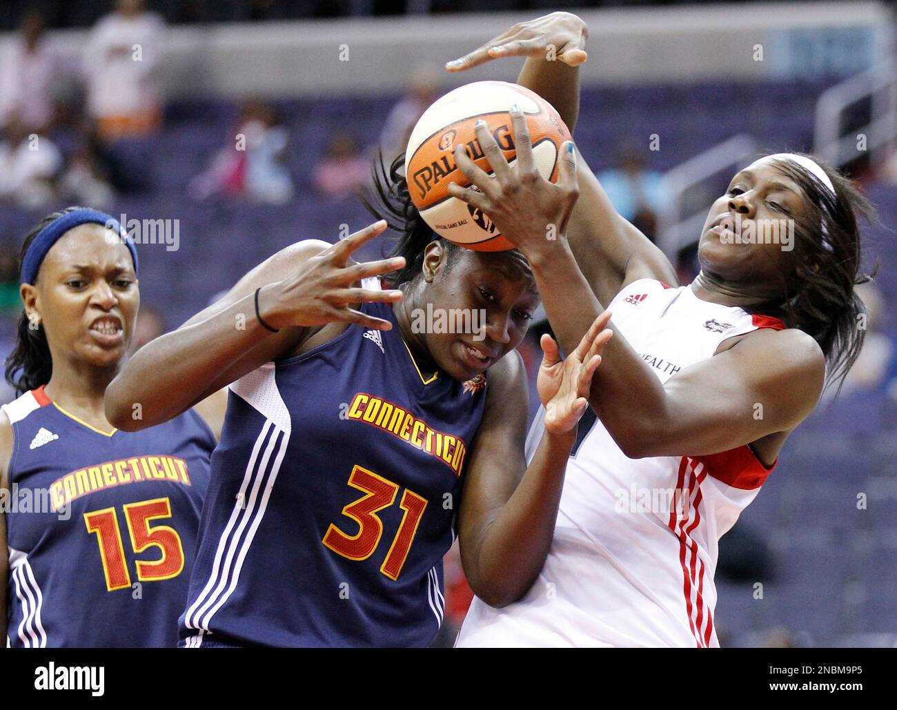 Connecticut Sun's Tina Charles (31) and Washington Mystics' Crystal ...