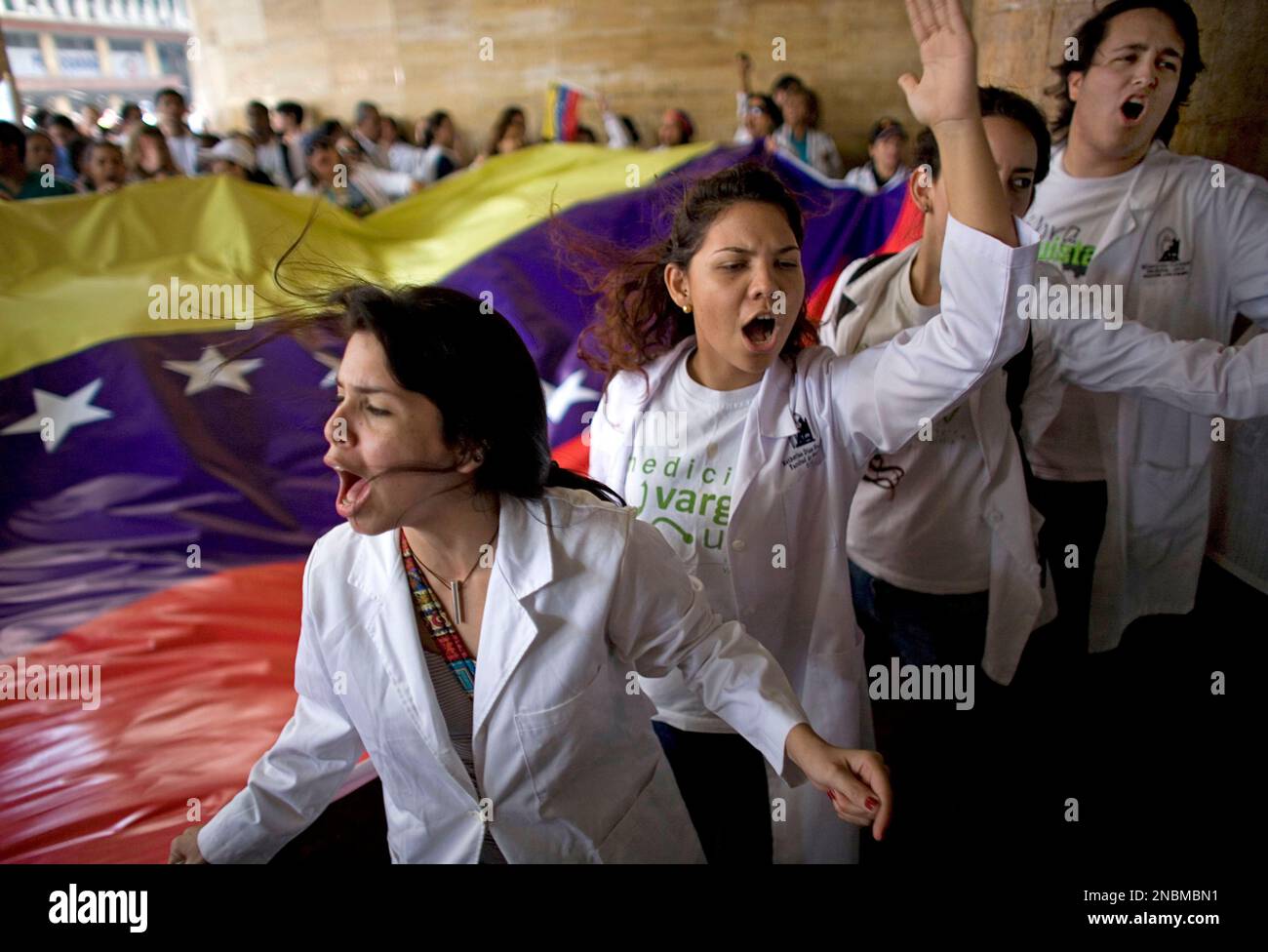 Medical students demonstrate during a protest demanding better wages ...