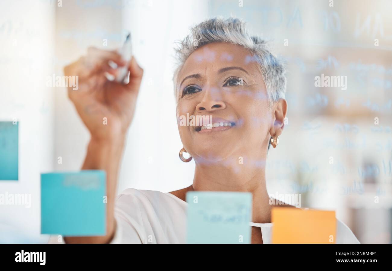 Senior business woman, writing and schedule planning for corporate ...