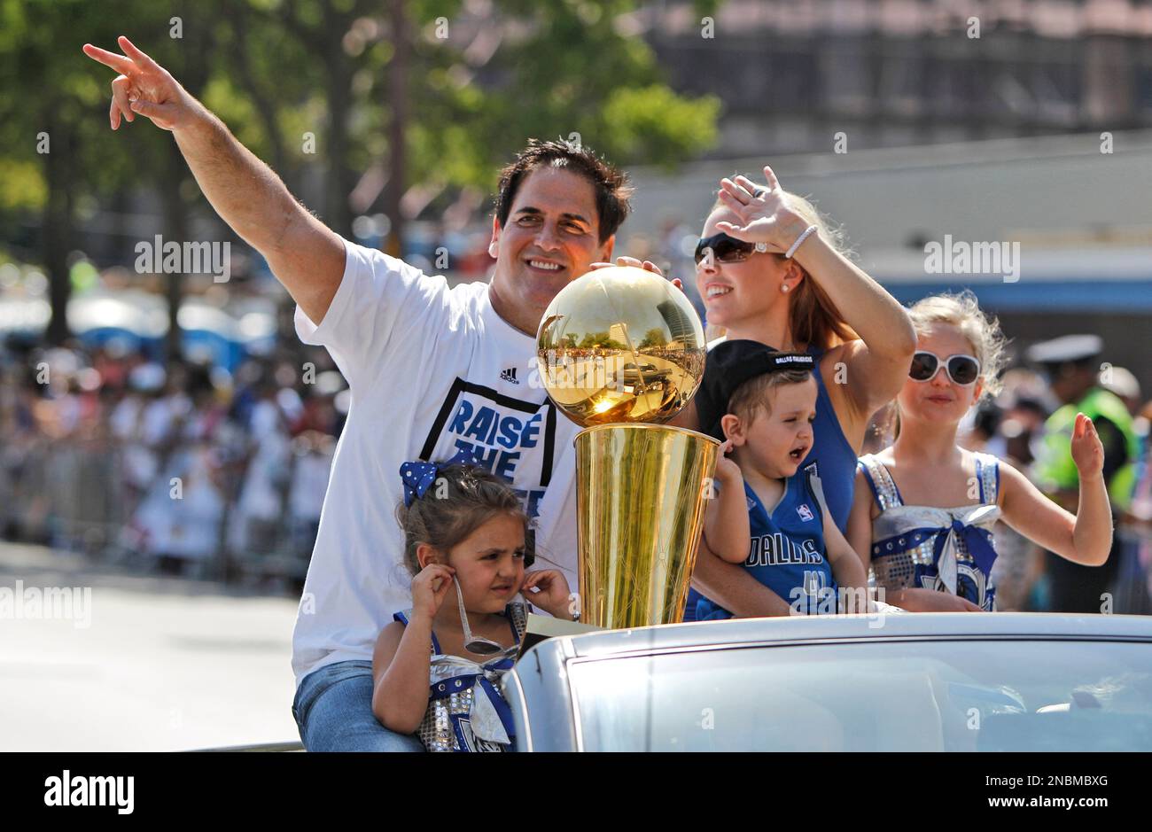 Dallas Mavericks owner Mark Cuban rides with the NBA Championship ...