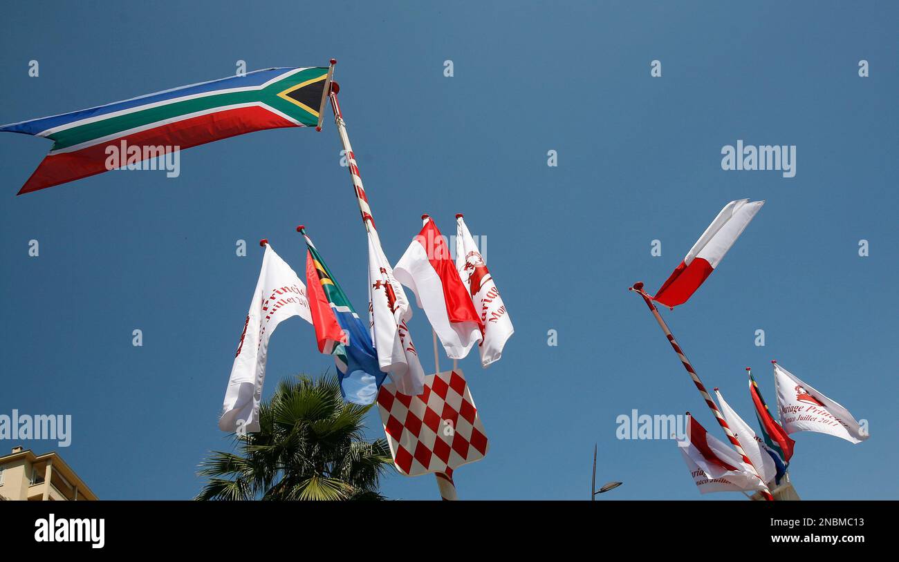 South African flag with flags announcing the Royal Wedding in Monaco ...