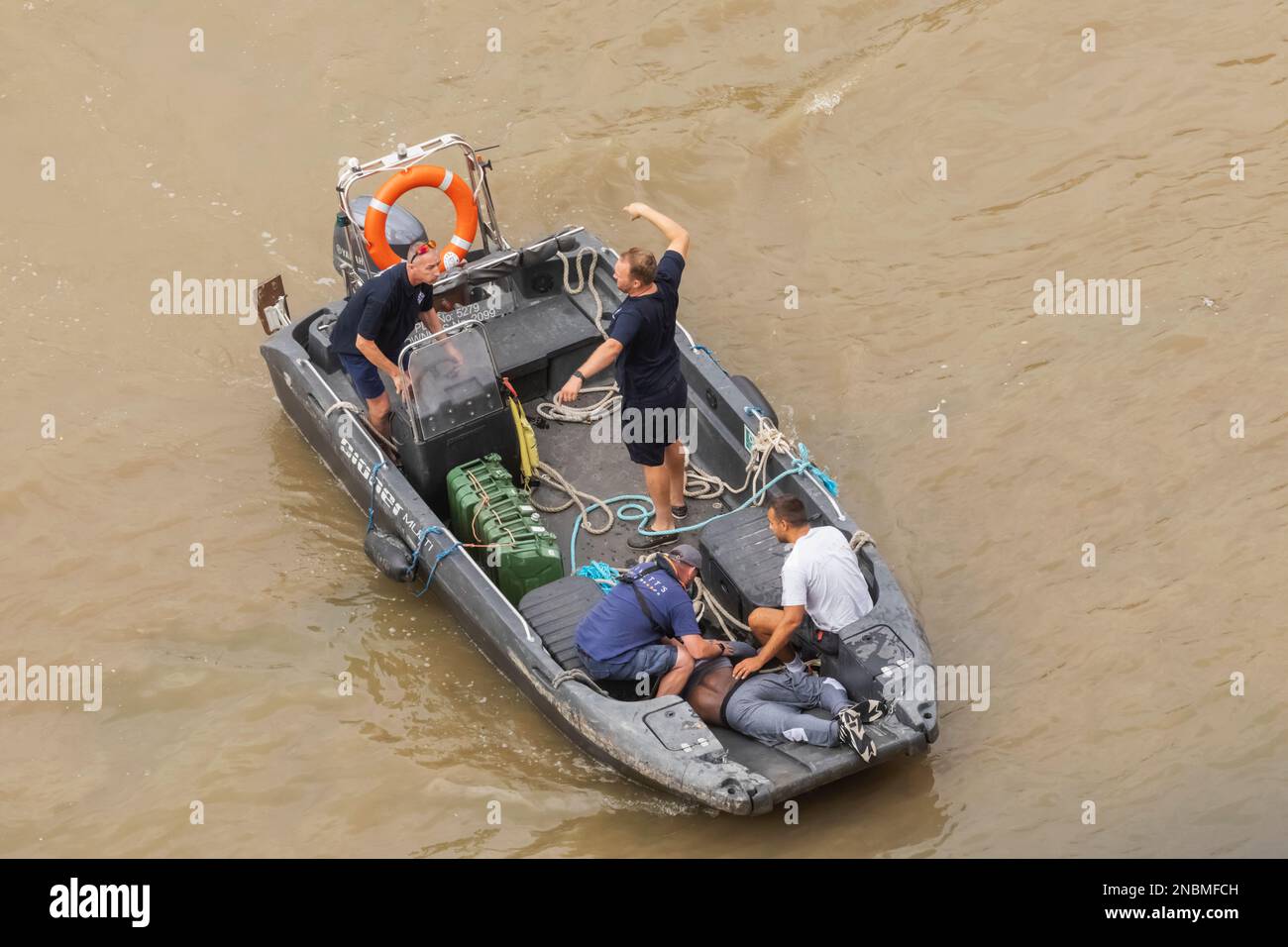 Man being rescued from river hi-res stock photography and images - Alamy