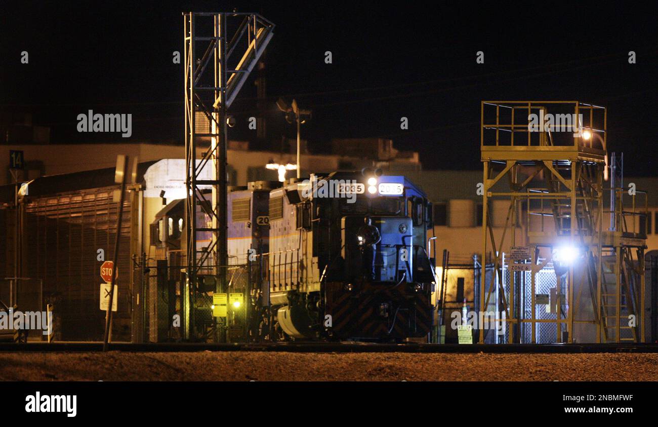 In this April 17, 2011 photo, a Mexican locomotive rolls slowly through ...
