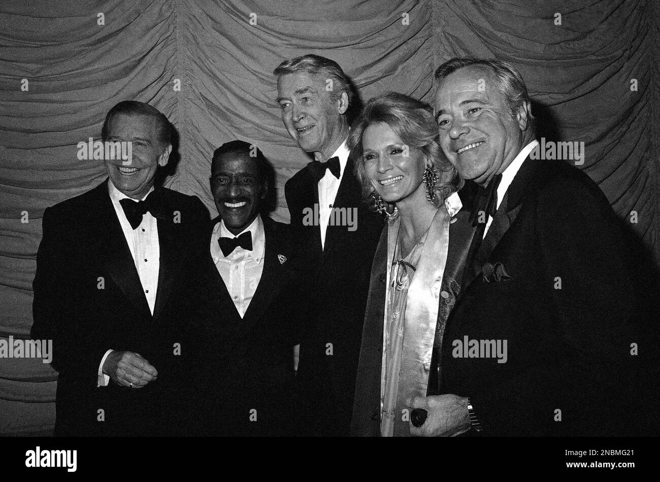 Entertainer Sammy Davis Jr., second from left poses with comedian ...