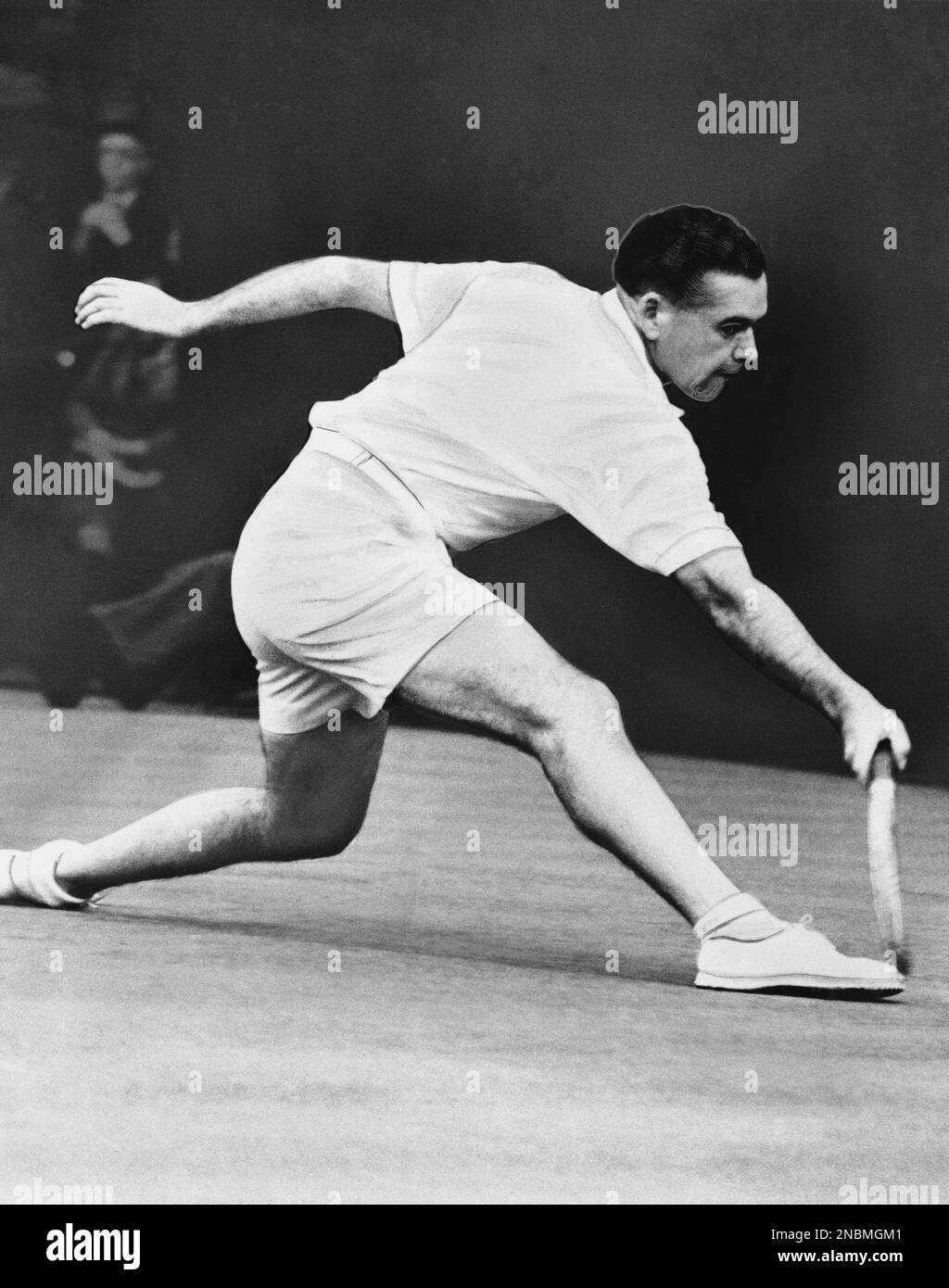 Playing professional sportsperson holding tennis racquet sport court hi ...