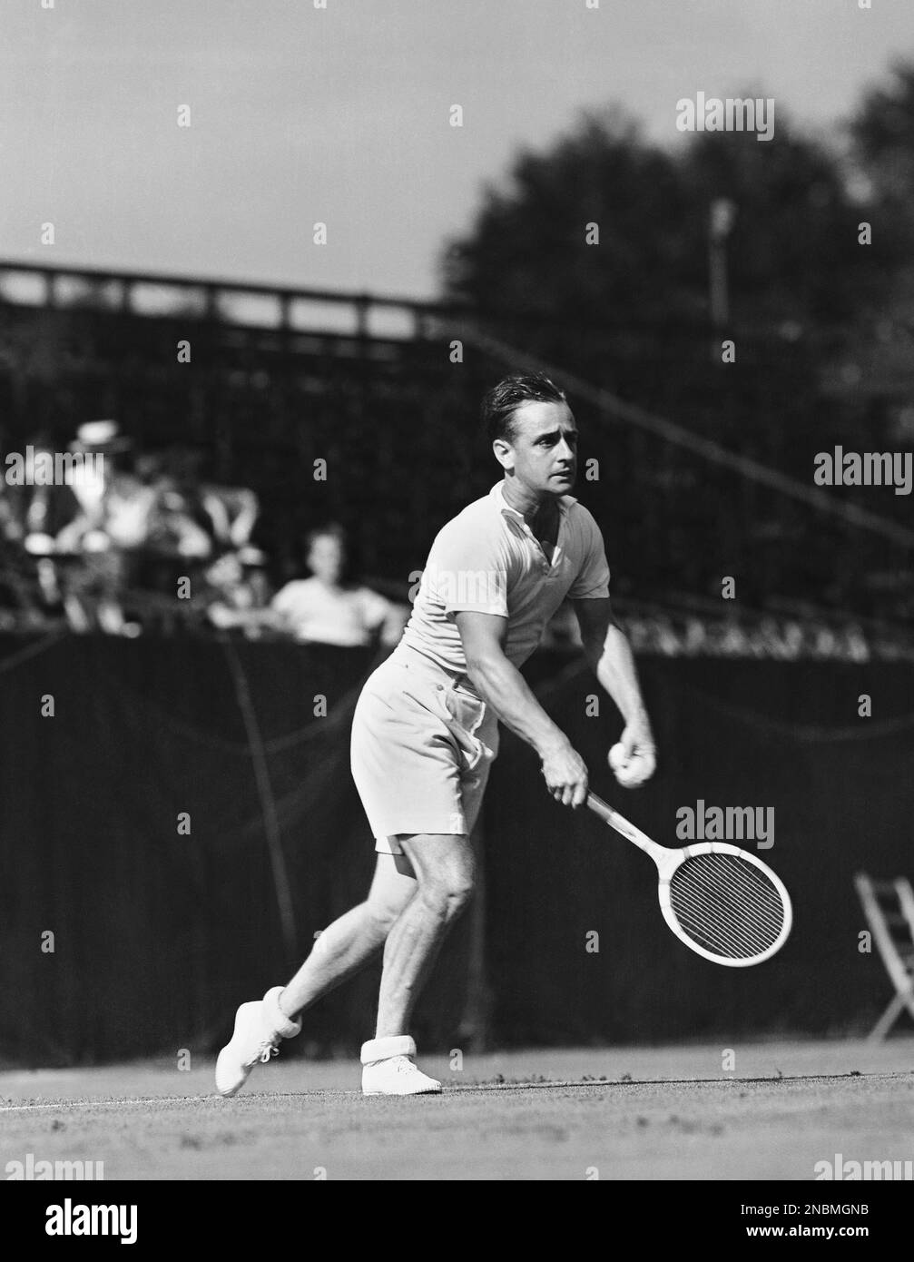 Adrian Quist, Australian Davis Cup player, shown as he took part in ...