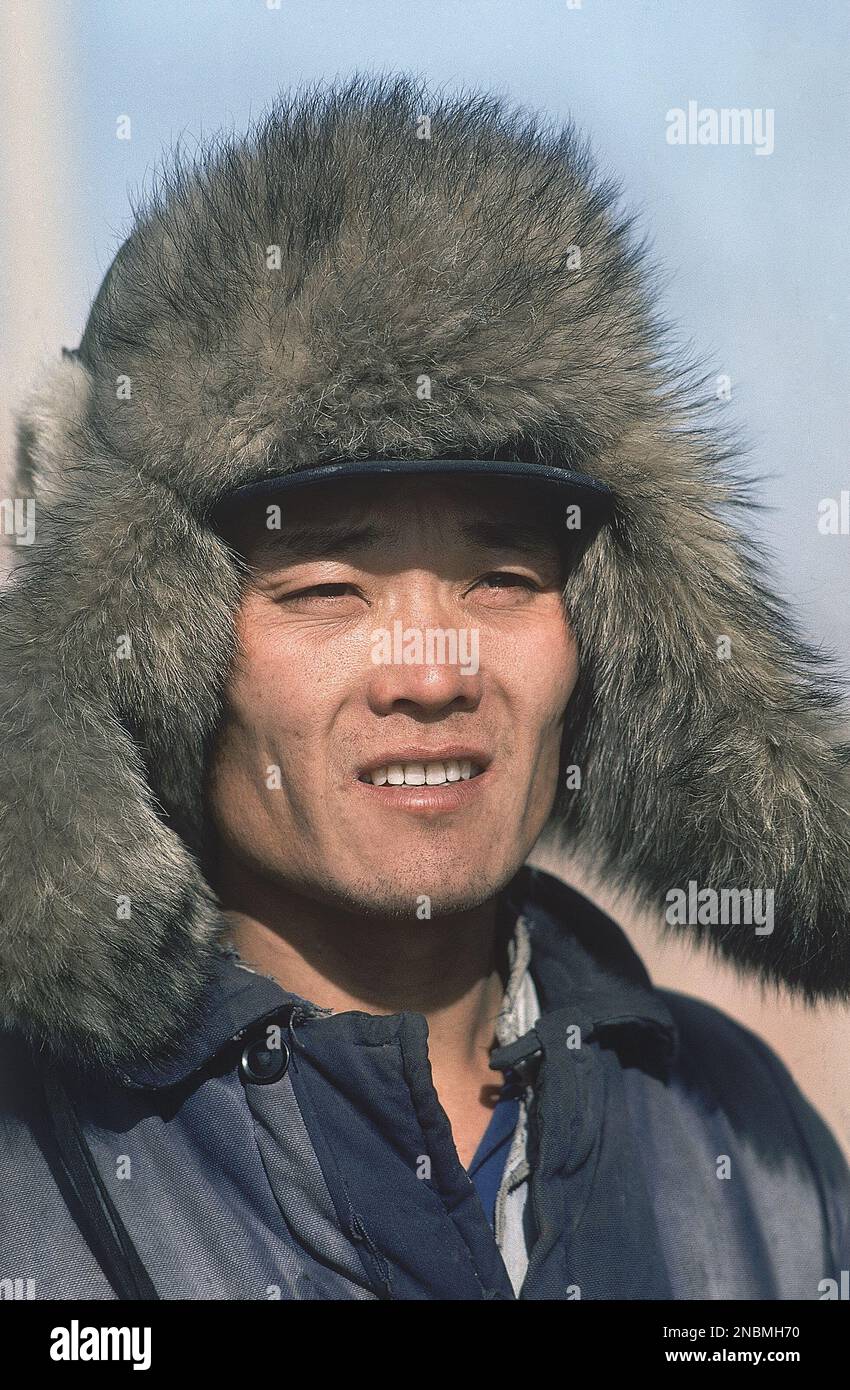 Worker of Sleng Li (Victory) oilfield in Shantung province, China in ...