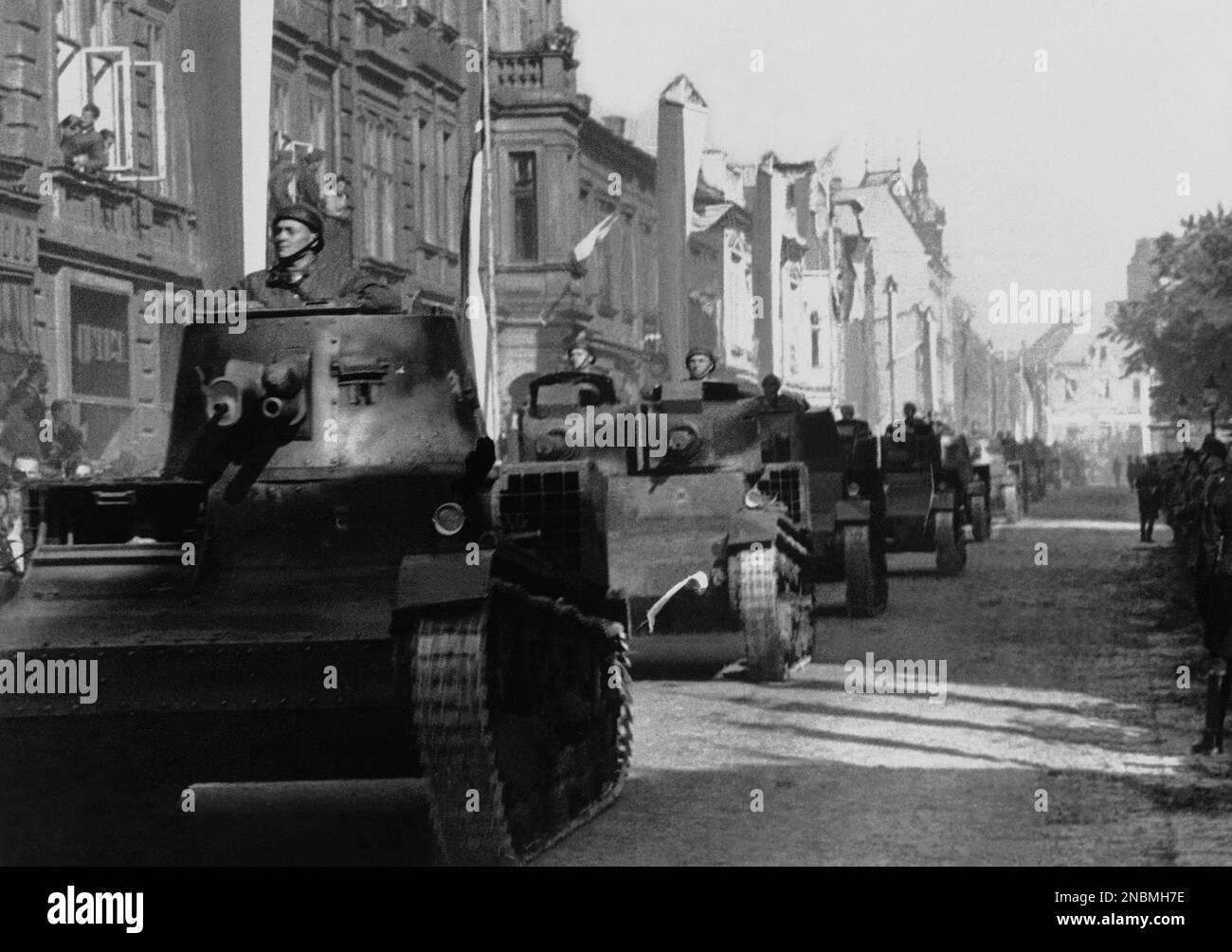 Polish tanks passing through streets of a town, during manoeuvers ...