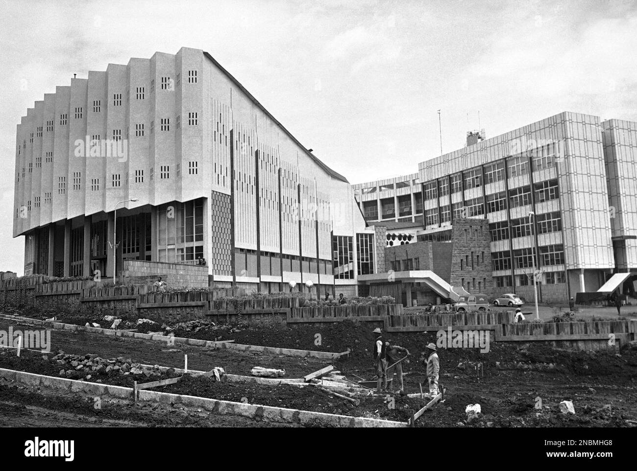 Workmen on a construction site in front of the City Hall in Addis Ababa ...