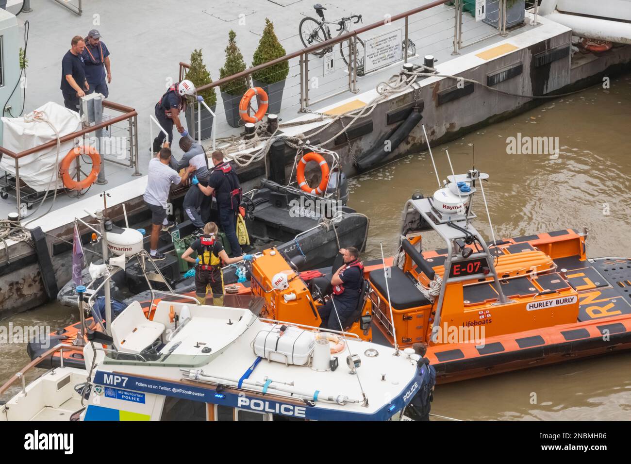 England, London, River Thames, Man Being Rescued from River Stock Photo ...
