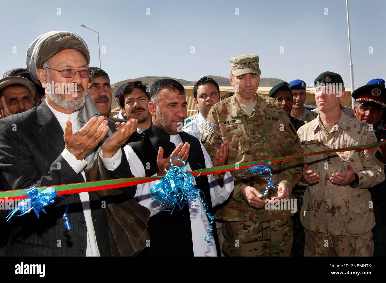 Afghanistan's second Vice President Mohammed Karim Khalili, front left ...