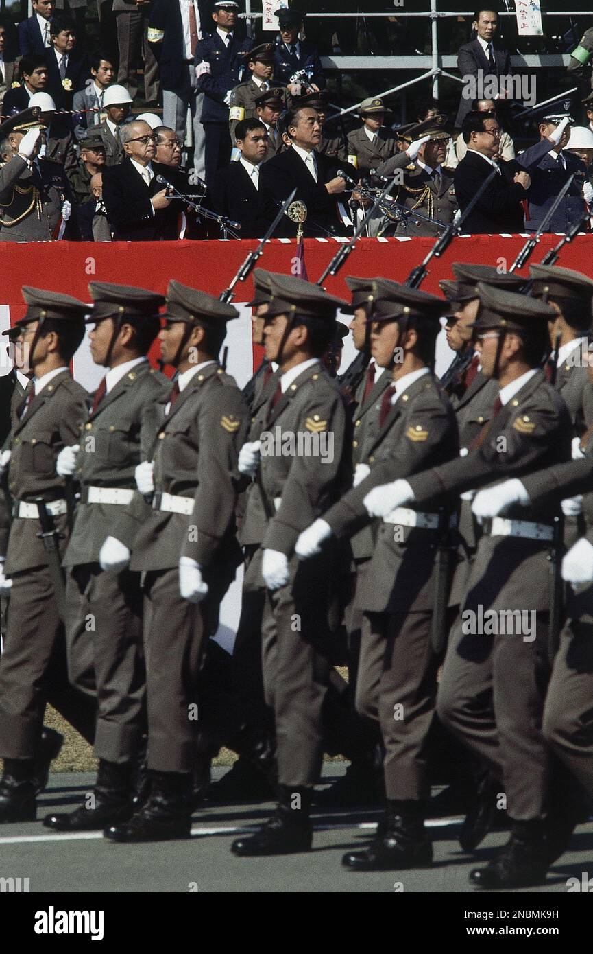 Japan’s ground self-defense forces military parade goes past a ...