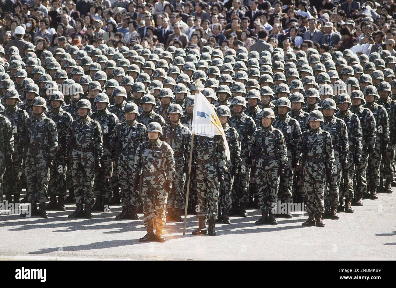 Japan’s ground self-defense forces military parade goes past a ...