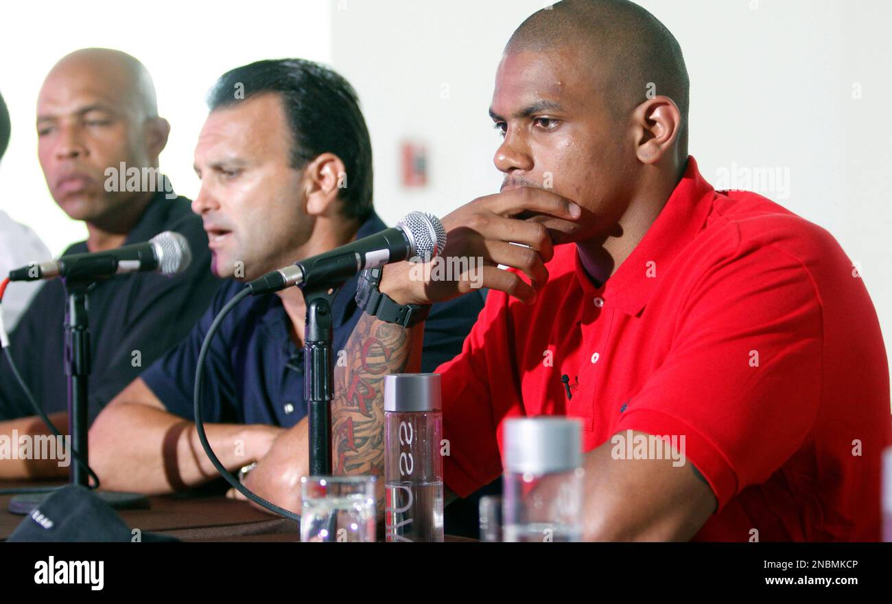 Former Ohio State football player Terrelle Pryor, right, and his agent Drew Rosenhaus, center ...