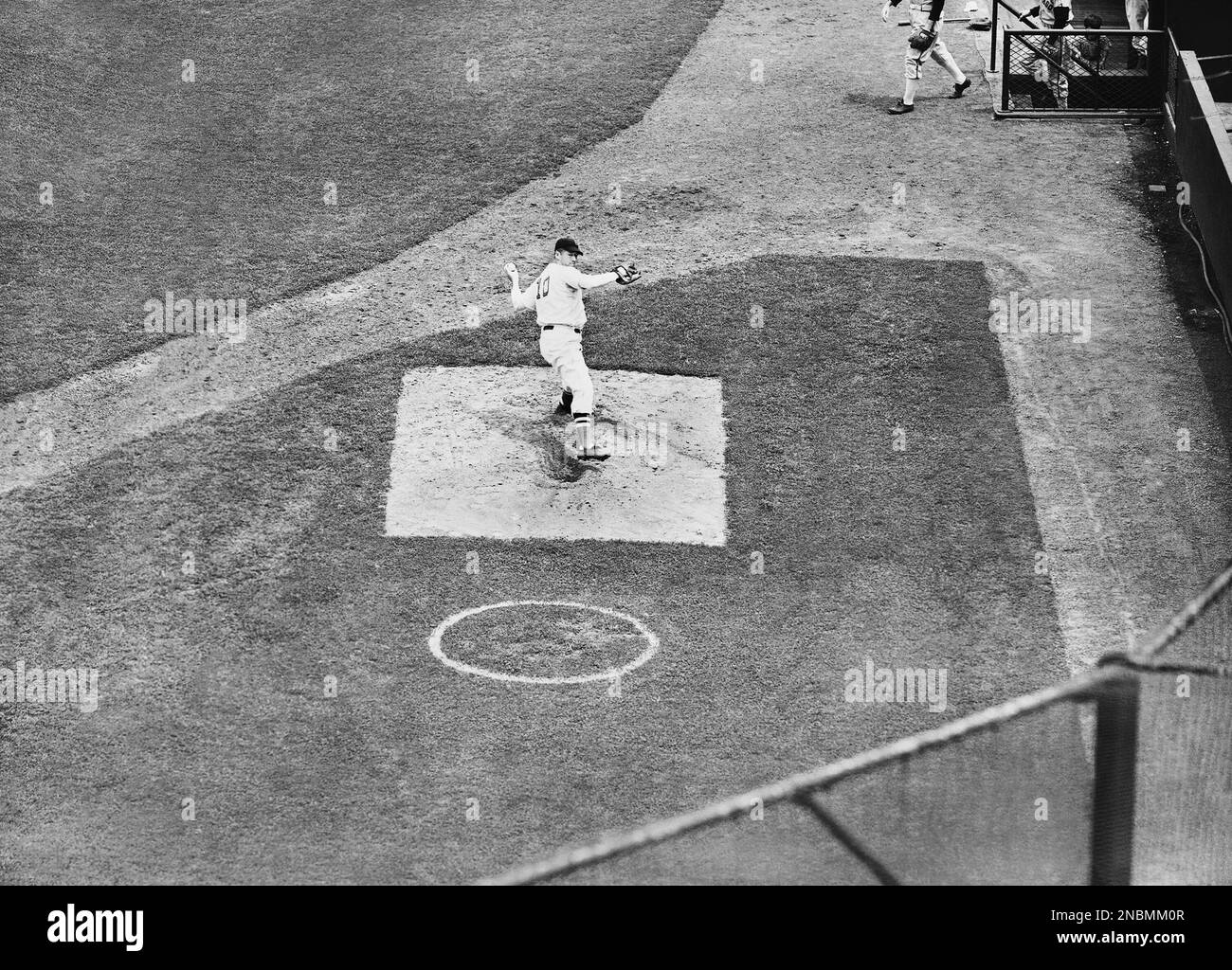 Lefty Grove warms up before winning his 10th at Boston on July 25, 1941 ...